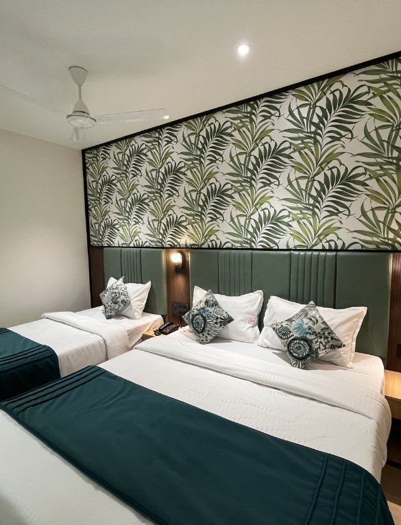 Deluxe Triple Bed Room - esquire